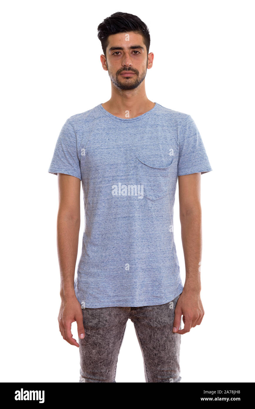 Studio shot of young Persian man standing Stock Photo - Alamy