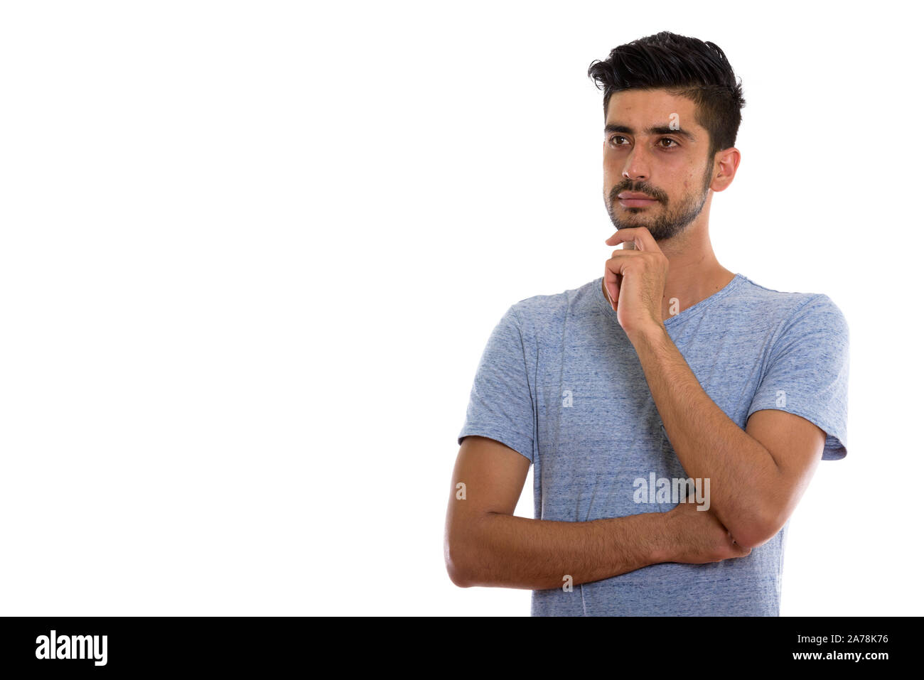 Young persian man thinking Cut Out Stock Images & Pictures - Alamy
