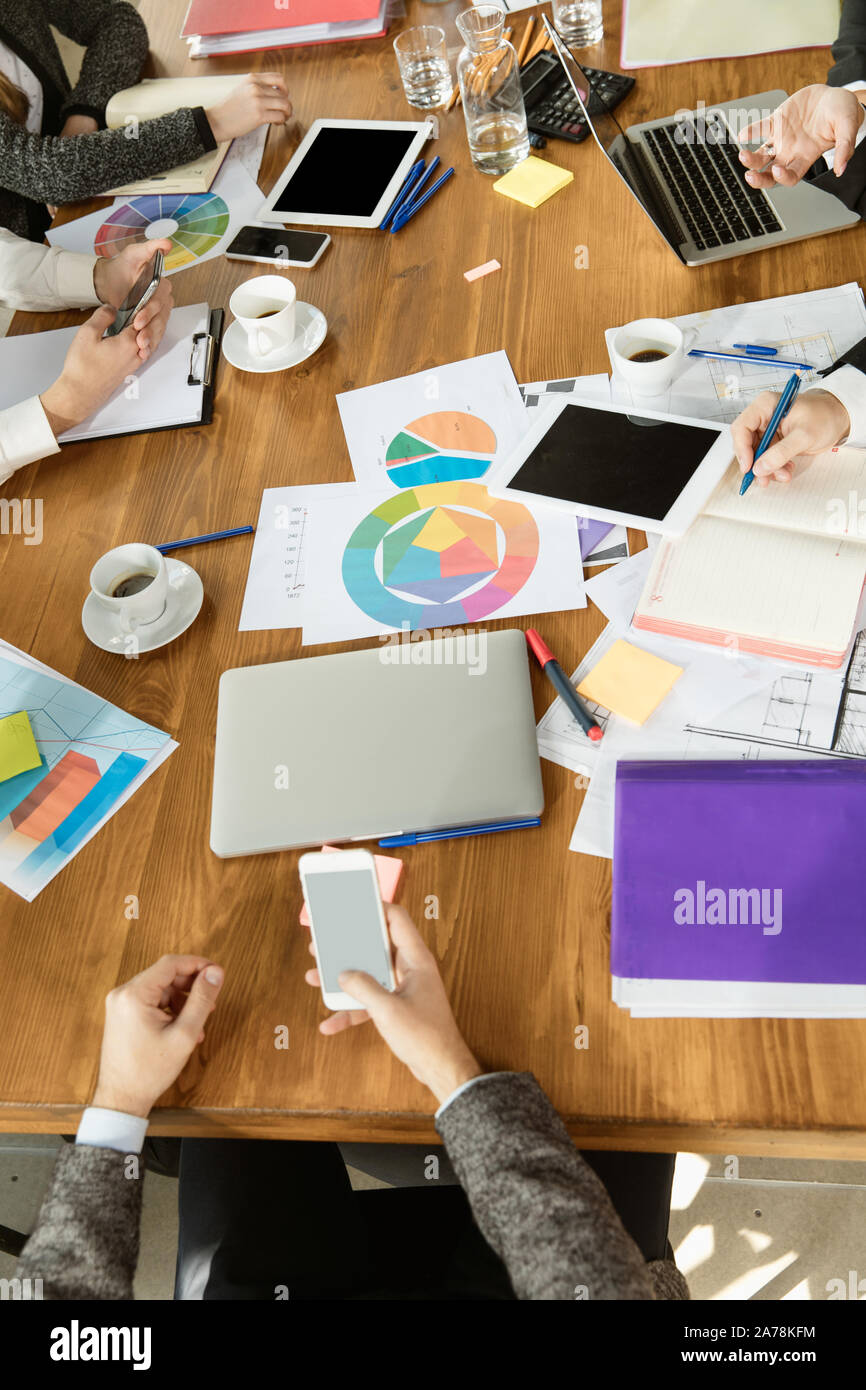 Group of young business professionals having a meeting. Diverse group ...