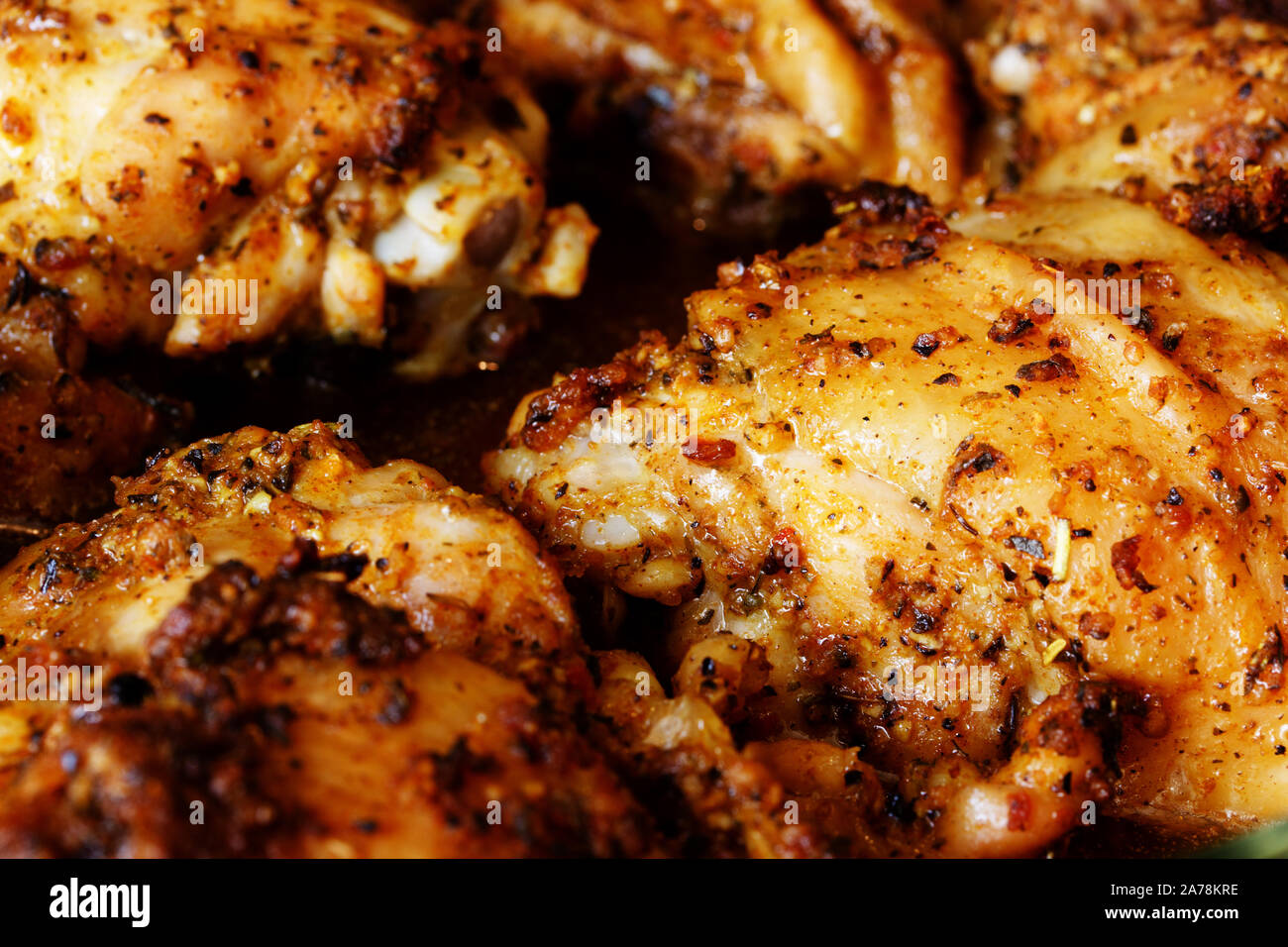 portions of chicken, baked in the oven Stock Photo - Alamy