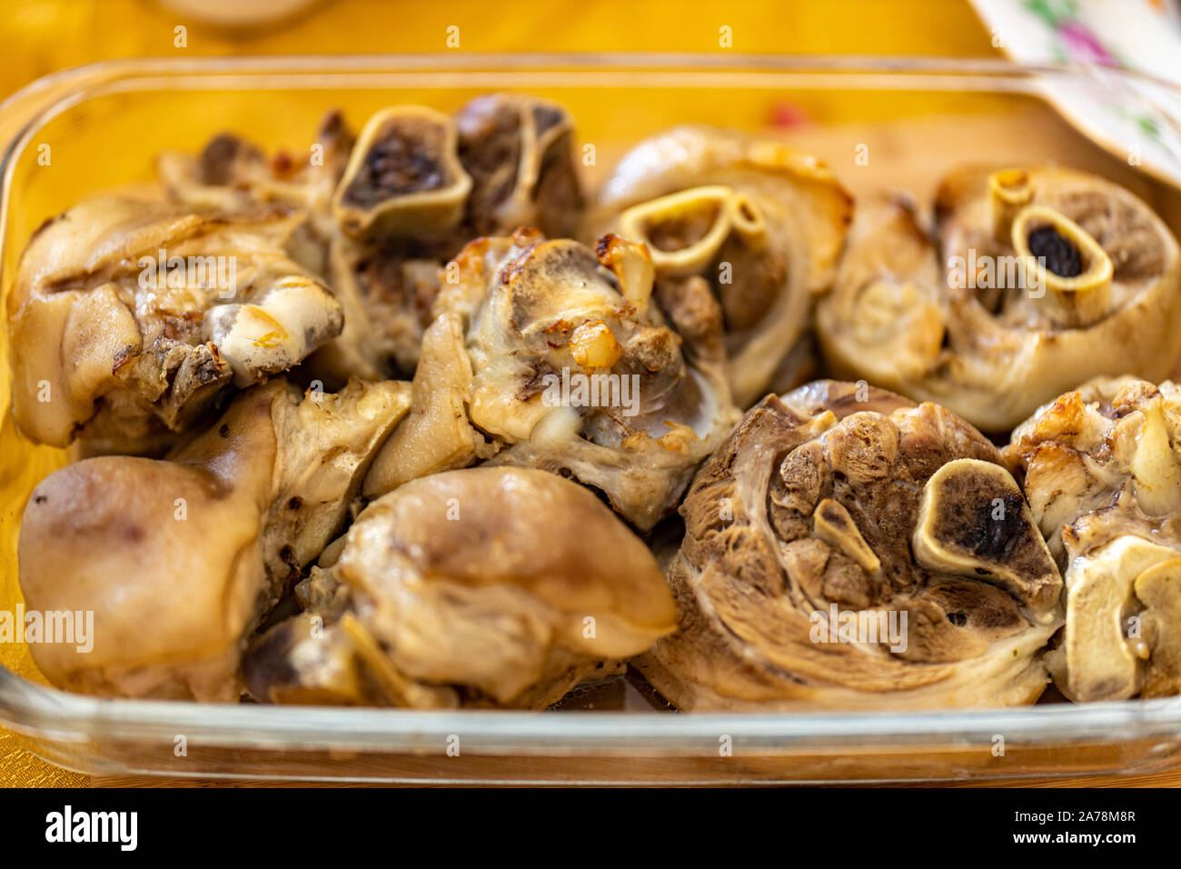 Boiled and Baked Pork Legs with Bones Lying in Glass Stock Photo - Alamy