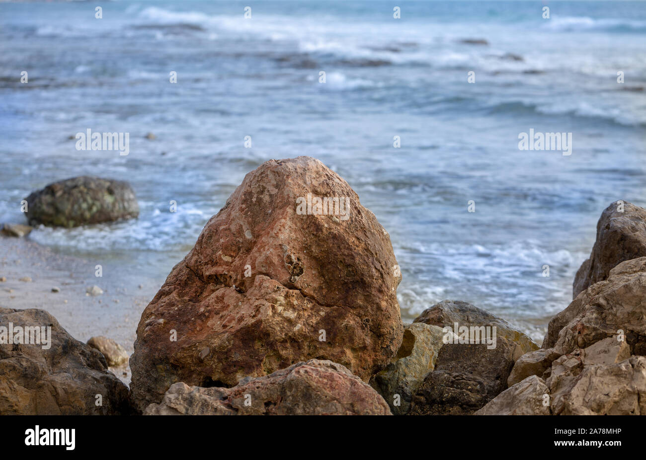 Rocks and stones of brown color by the sea Stock Photo - Alamy