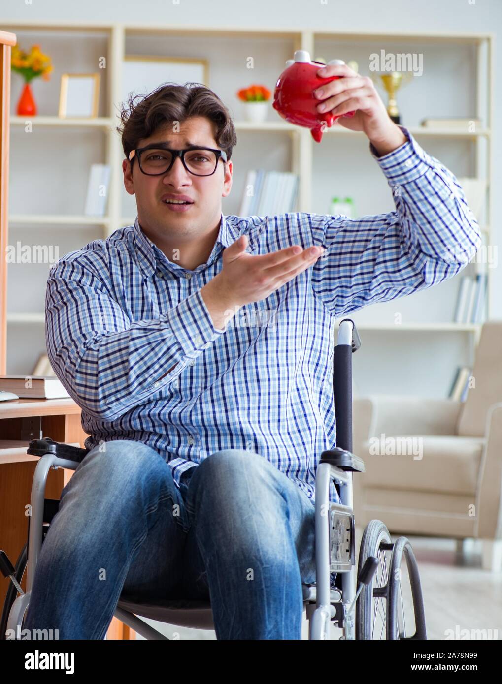 The disabled student studying at home on wheelchair Stock Photo - Alamy
