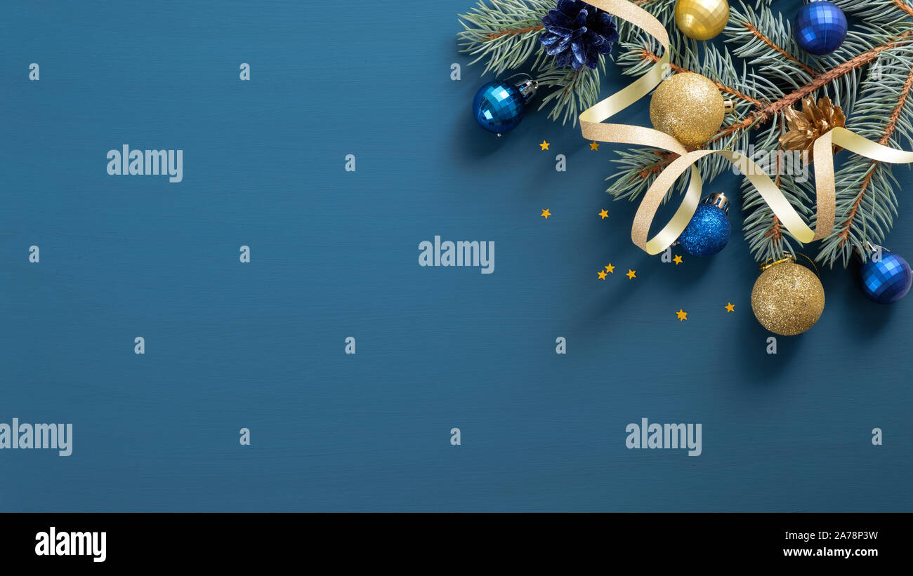Christmas banner mockup with fir tree branches, golden ribbon, ball ...