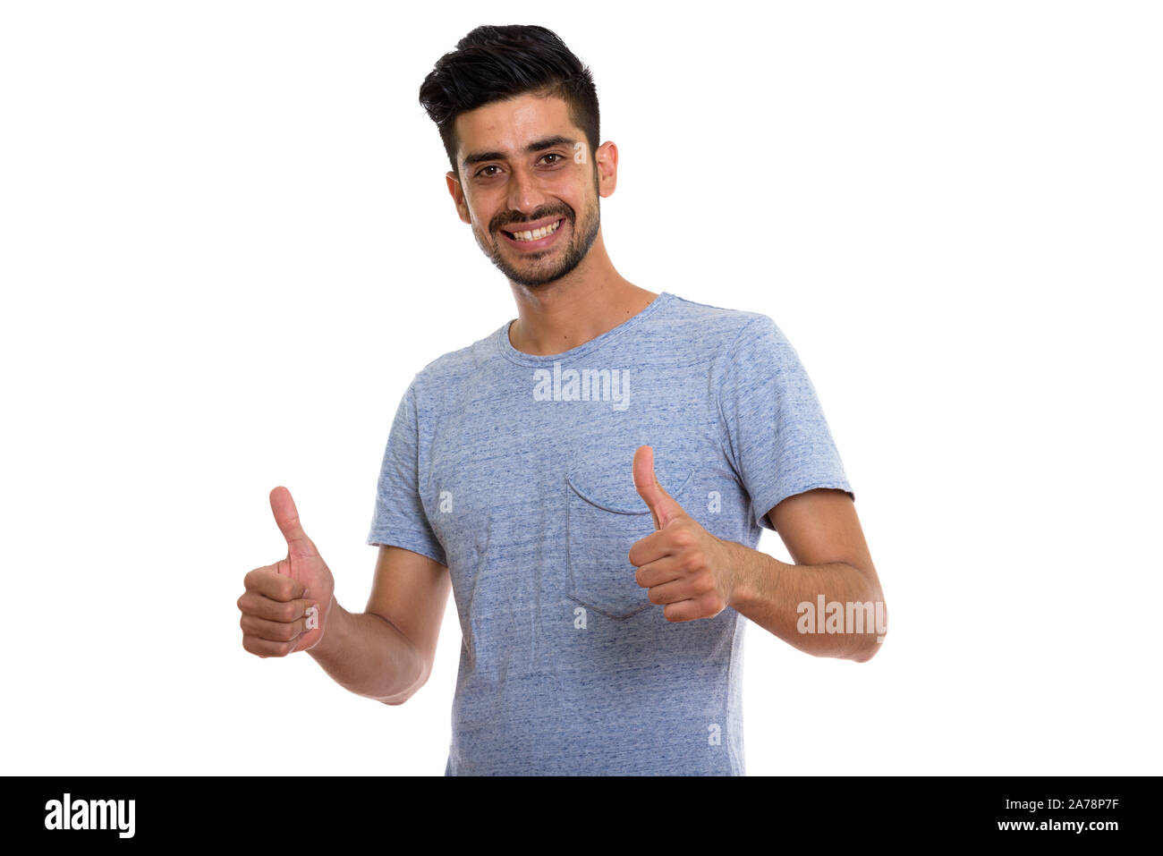Young happy Persian man smiling while giving thumbs up Stock Photo - Alamy