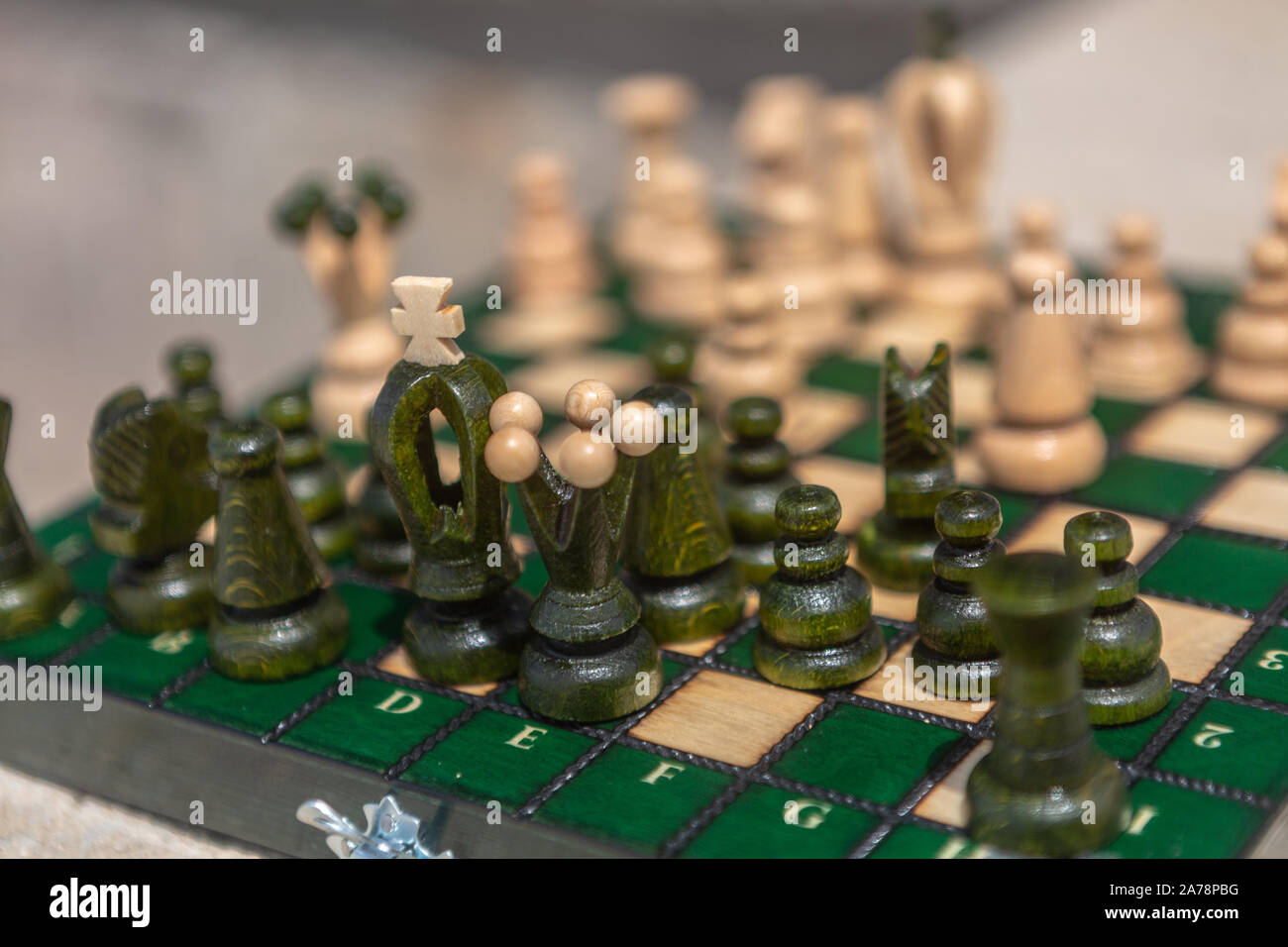 Macro Green and Yellow Chess on a chessboard Stock Photo - Alamy