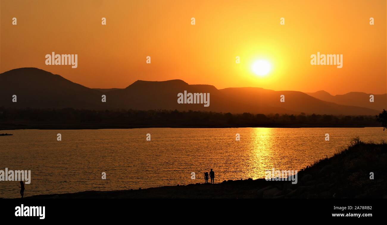Sun Set at dam- back water Stock Photo - Alamy