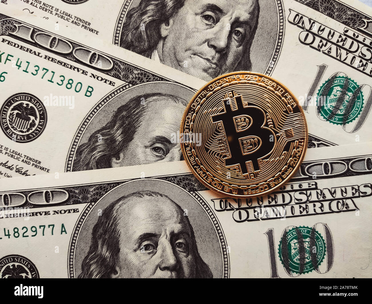 Bitcoin physical coin in US dollars. Digital currency Stock Photo - Alamy
