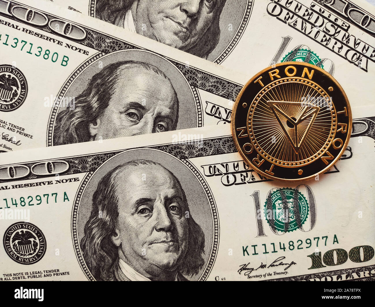 Tron TRX physical coin in US dollars. Digital currency Stock Photo - Alamy