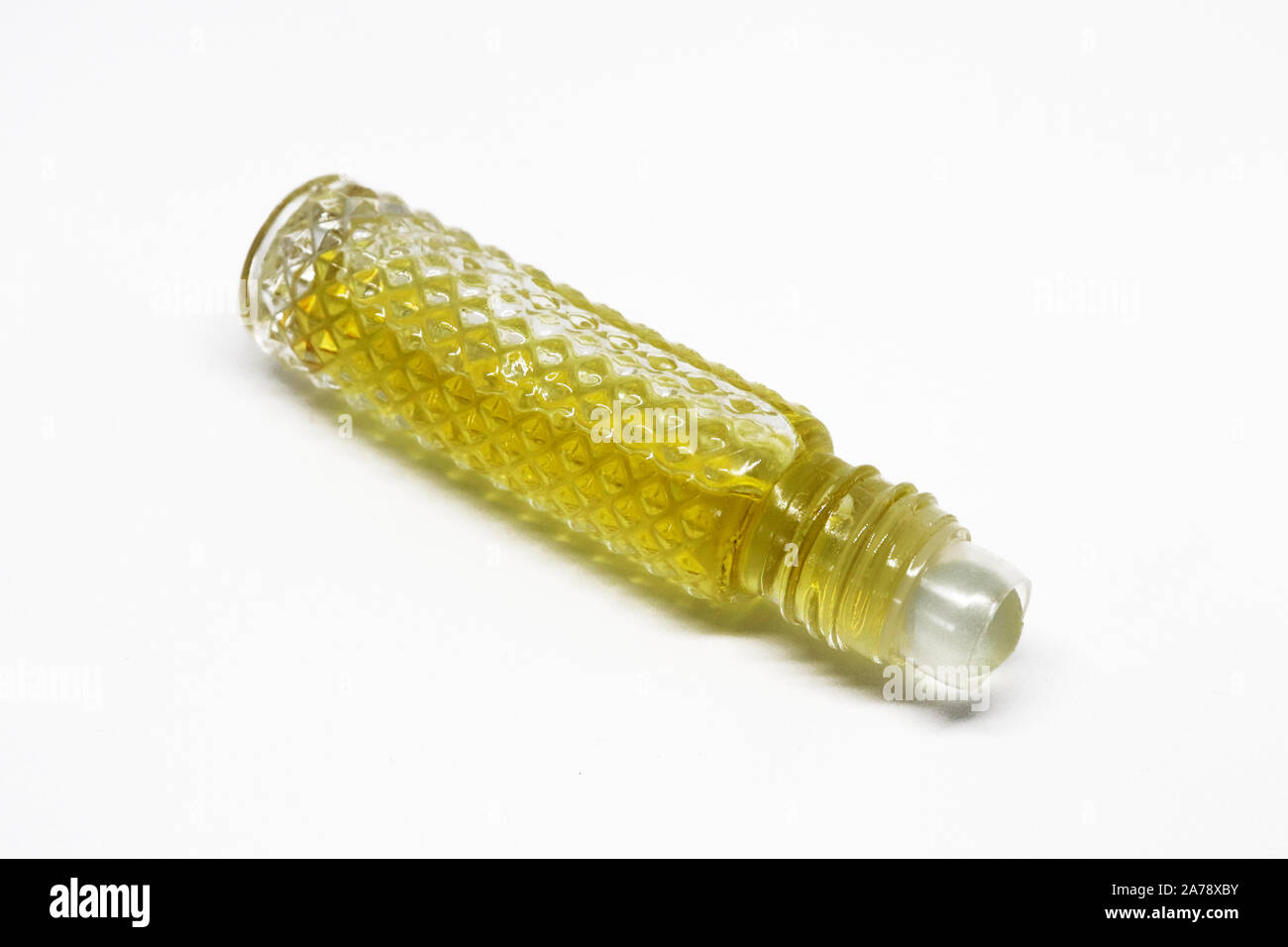 Beautiful attar perfume isolated in white background Stock Photo - Alamy