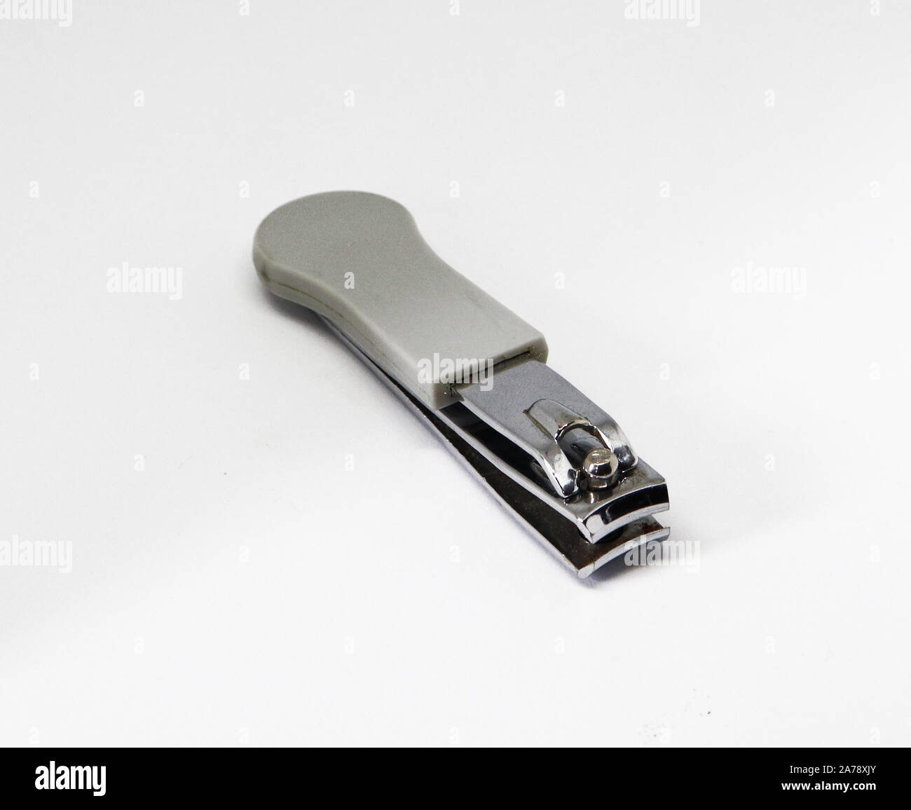 White nail clippers isolated on white background Stock Photo - Alamy