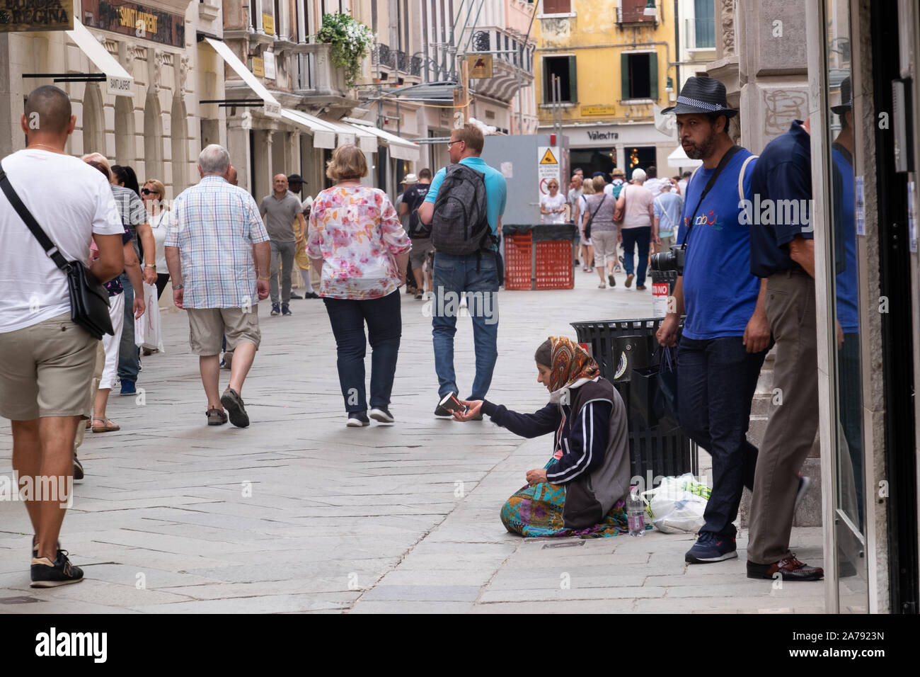People Begging High Resolution Stock Photography and Images - Alamy