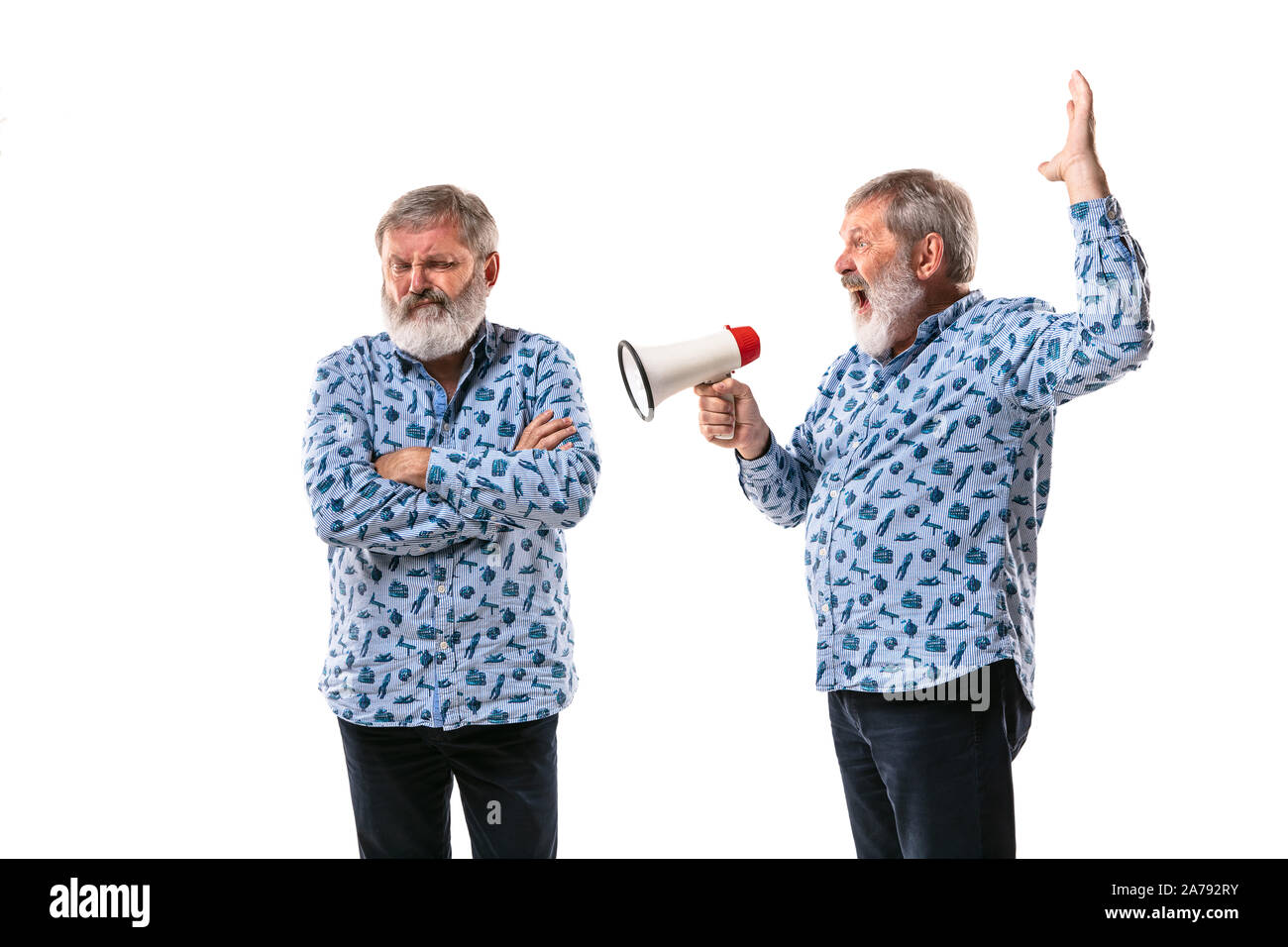 Senior man arguing with himself on white studio background. Concept of ...