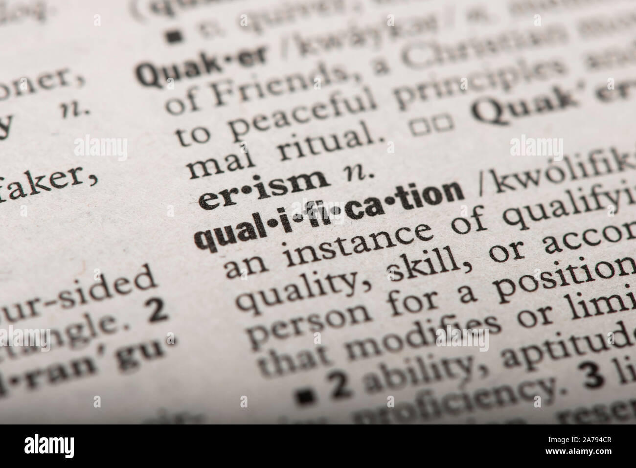 Definition of "Qualification" in a Dictionary Stock Photo - Alamy