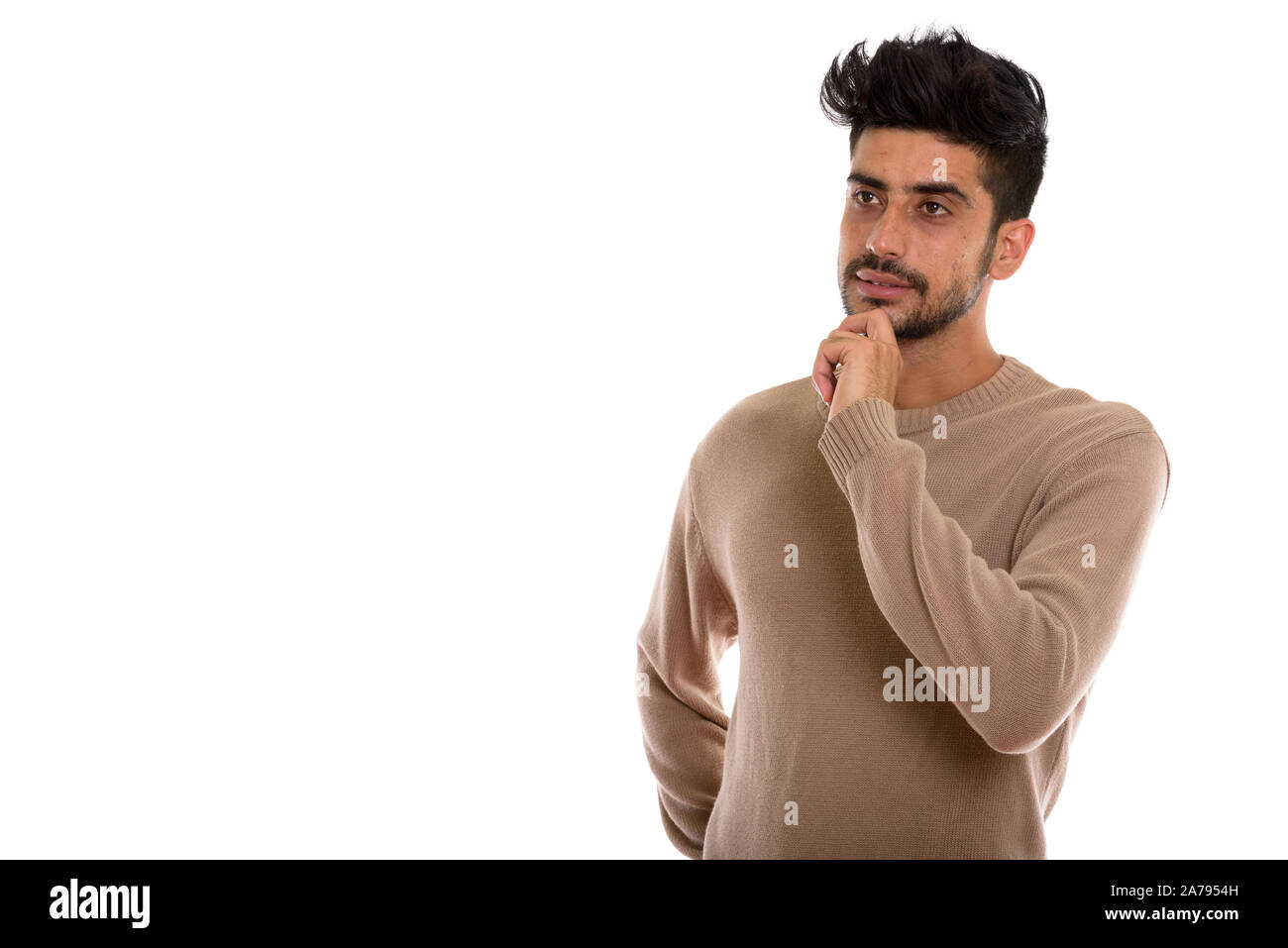 Young persian man thinking Cut Out Stock Images & Pictures - Alamy