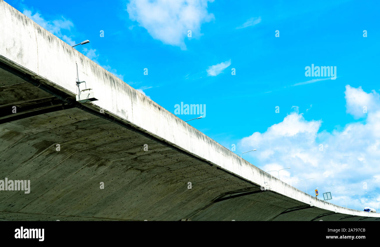 Bottom view of elevated concrete highway. Overpass concrete road. Road ...