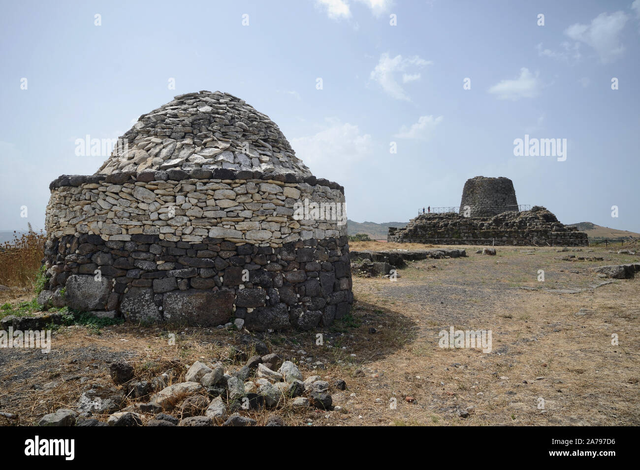 A circular stone hut rebuilt like the old ones near the ancient Nuraghe ...