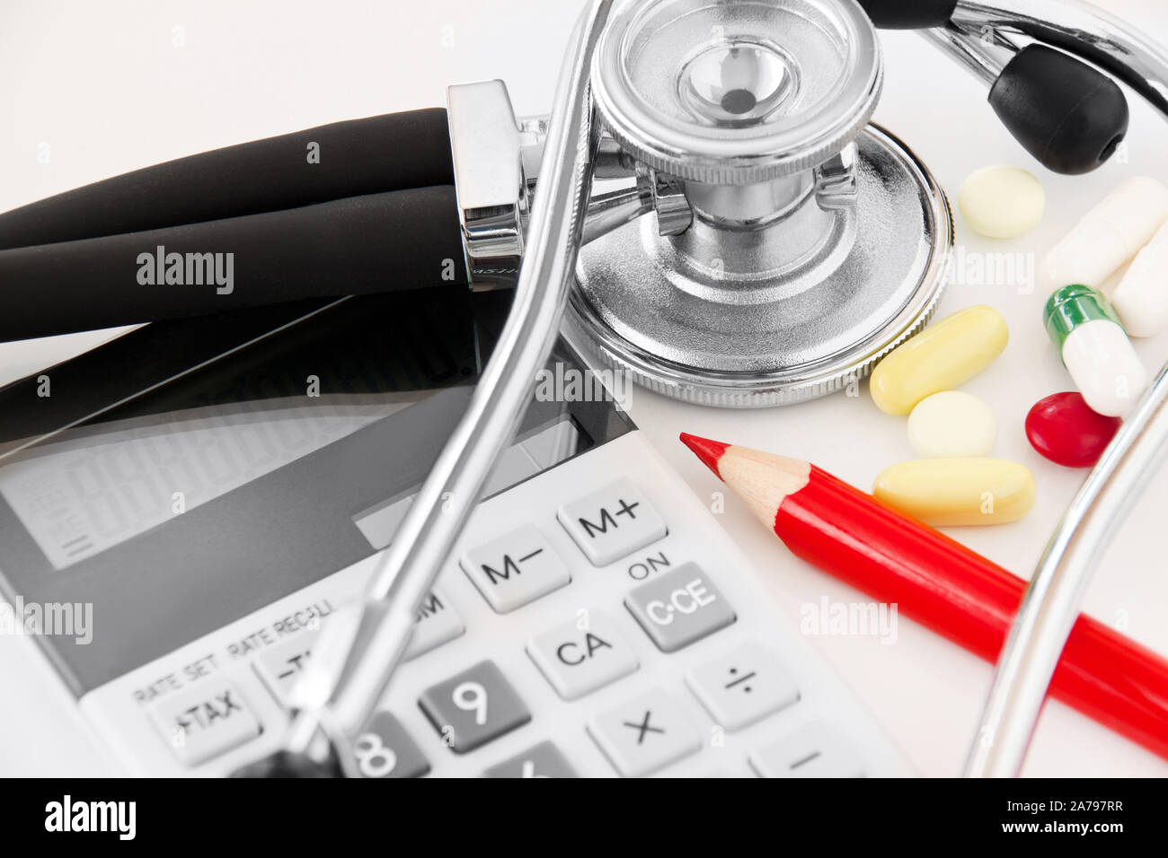 Medical care - prices concept with calculator and stethoscope Stock ...