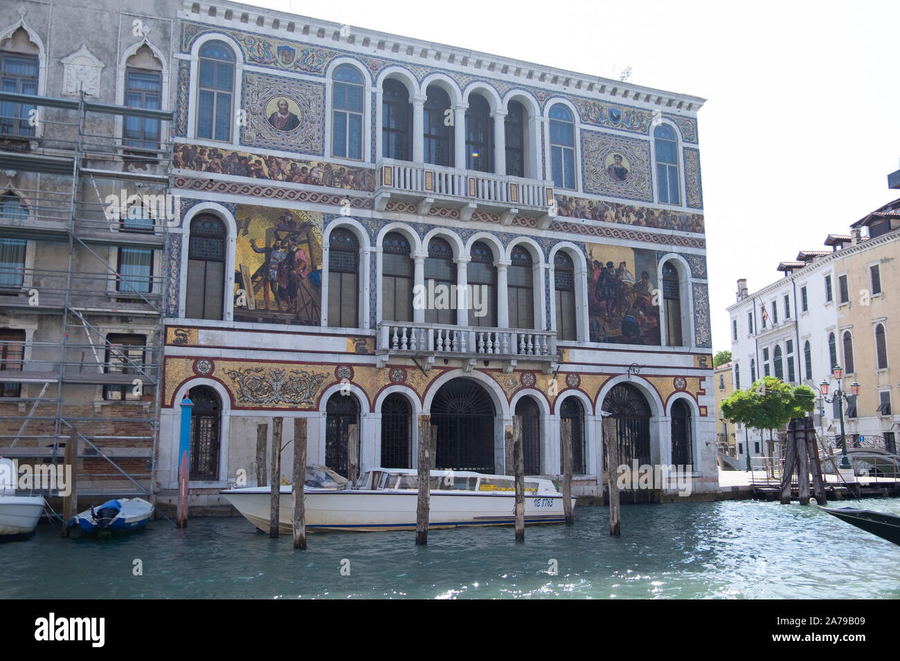 Magnificently decorated and painted exterior of a three story multi ...