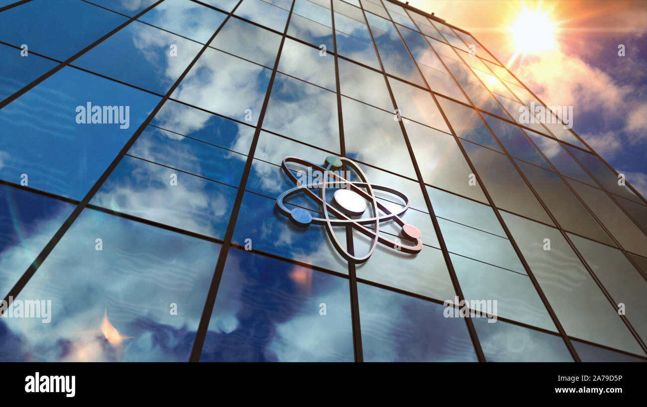 Atom energy symbol on glass building. Mirrored sky and city on modern ...