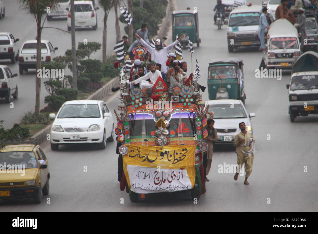 View of all parties workers on the way going for a long march from JUI ...