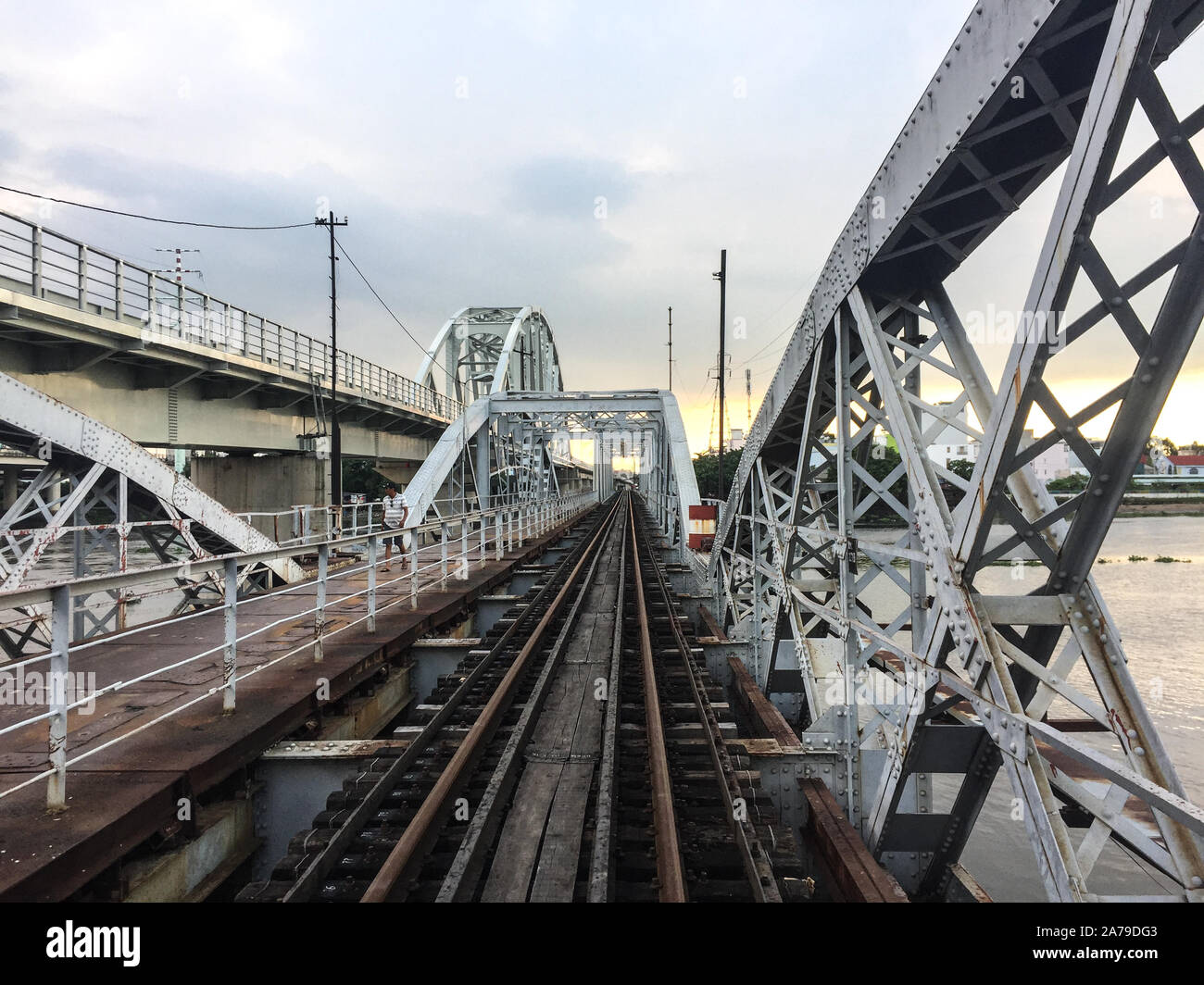 Railway tracks at ancient steel rail bridge in Saigon, Vietnam Stock ...