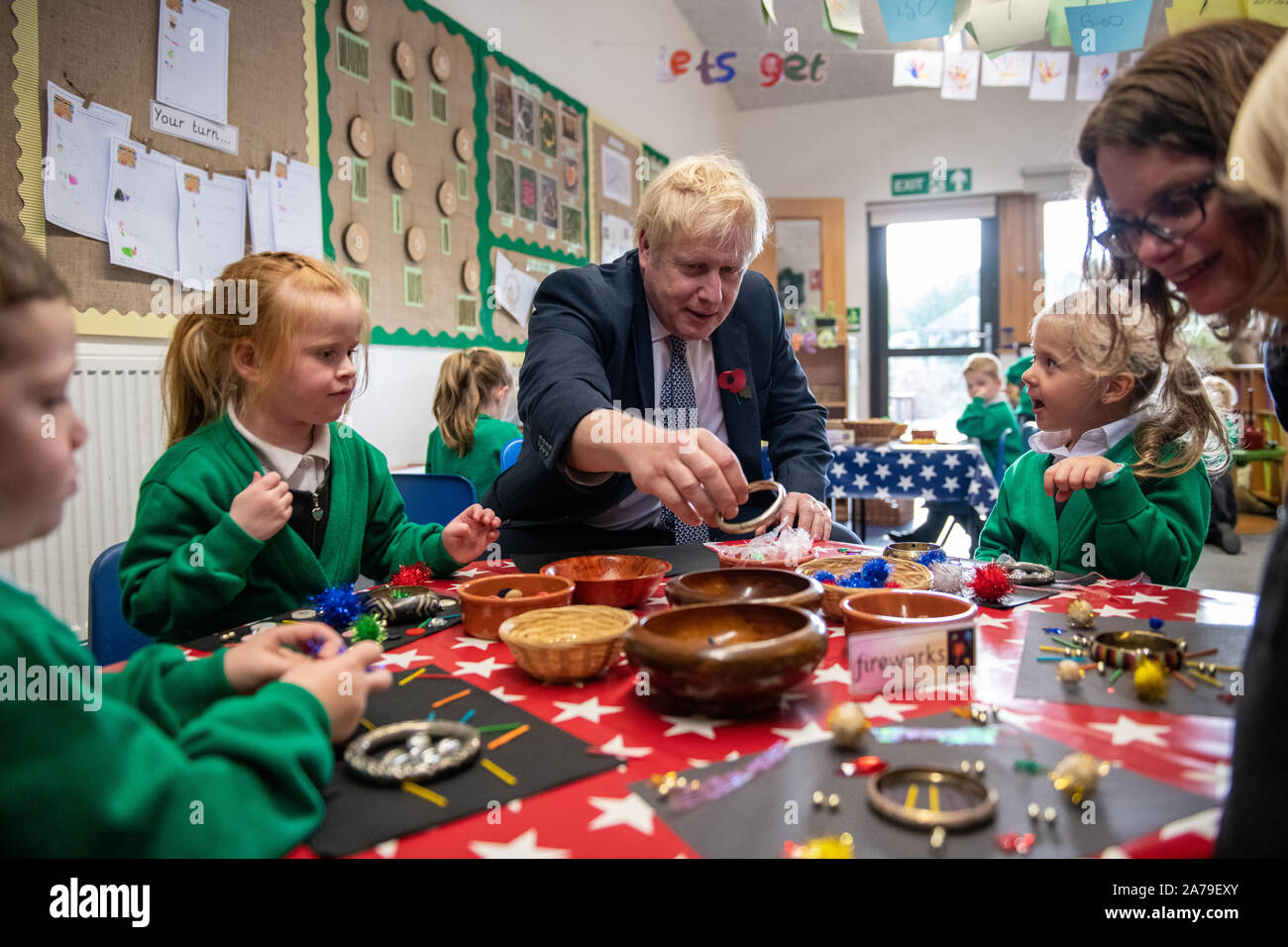 Prime Minister Boris Johnson makes pictures of fireworks with students ...