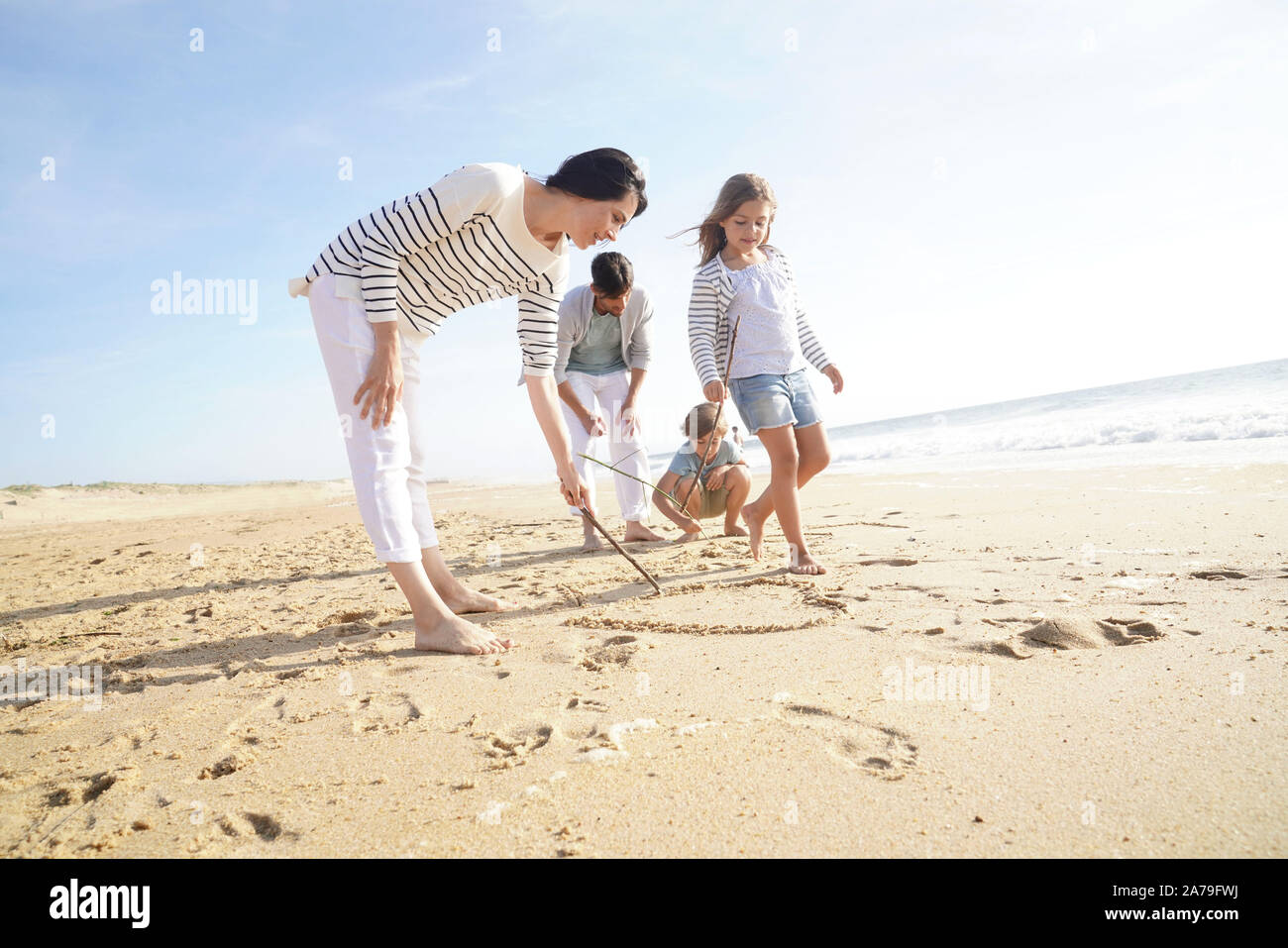 Family Writing Sand High Resolution Stock Photography and Images - Alamy