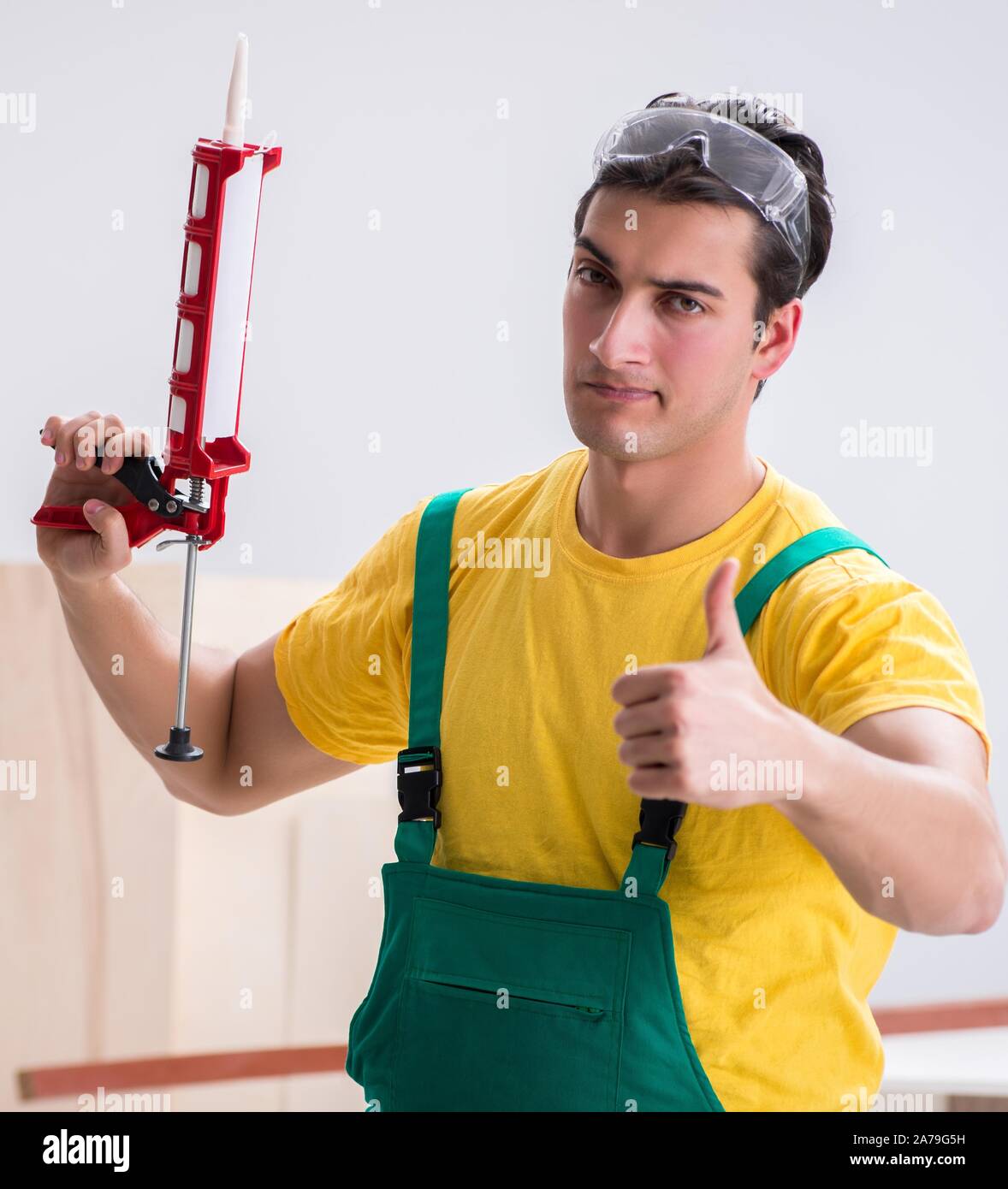 The construction worker working on contractor site Stock Photo - Alamy