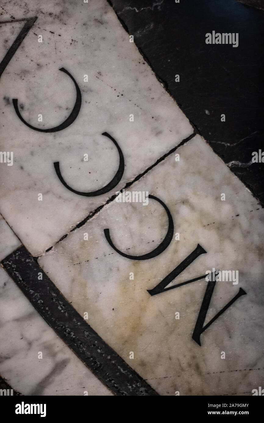 Roman old italic numbers carved on marble stone Stock Photo - Alamy