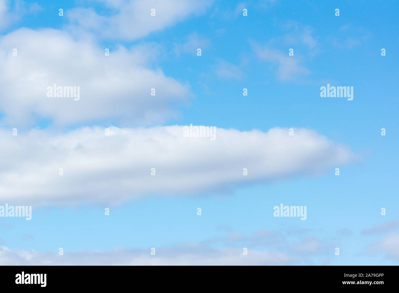 blue sky with flying white light clouds Stock Photo - Alamy