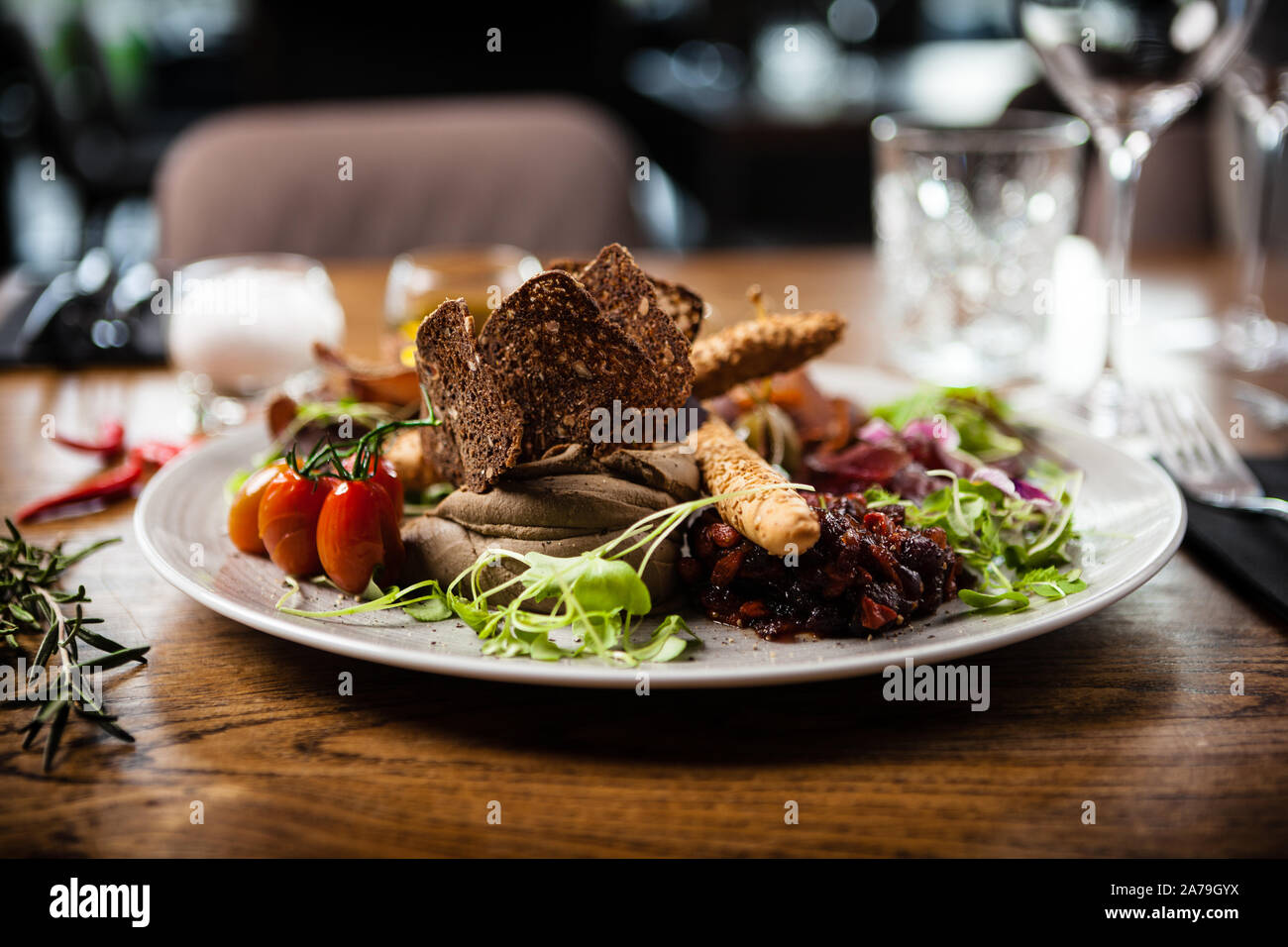 Meat platter for two served on a plate in restaurant Stock Photo - Alamy