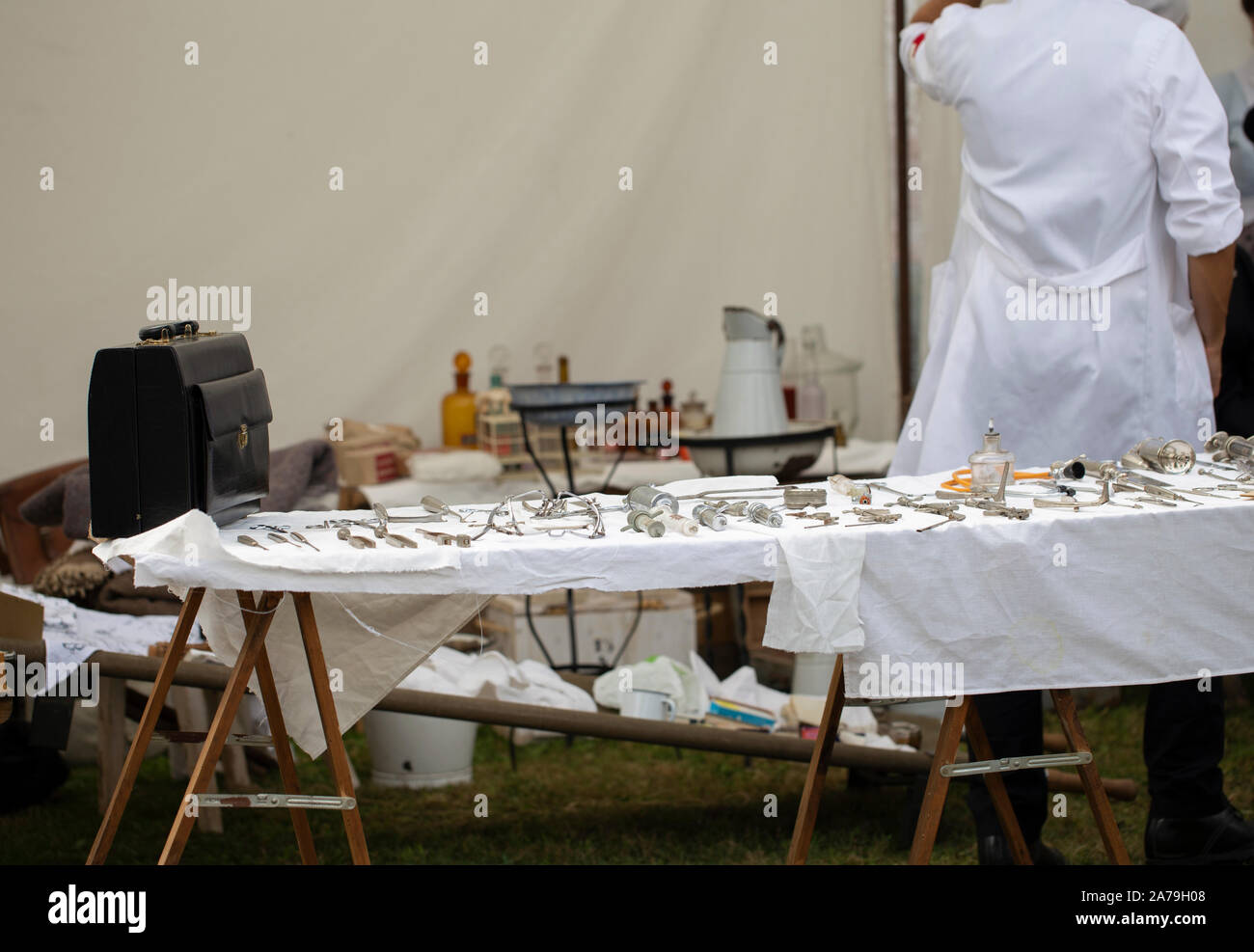 Antique Surgical Instruments and rear view of a doctor Stock Photo - Alamy
