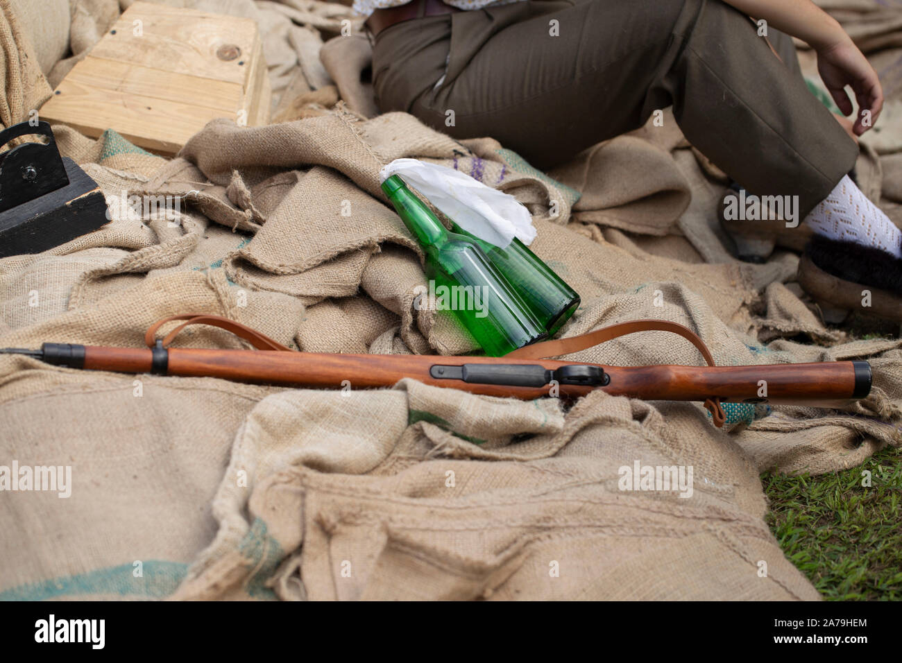 Homemade bottle bombs and a soldier Stock Photo - Alamy