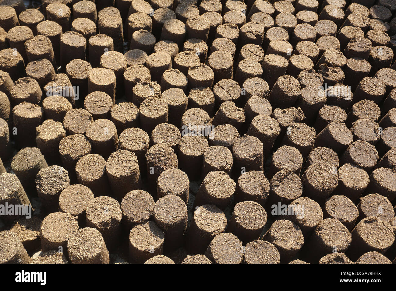 Palestinians make molds from olive pomace that is obtained from the ...