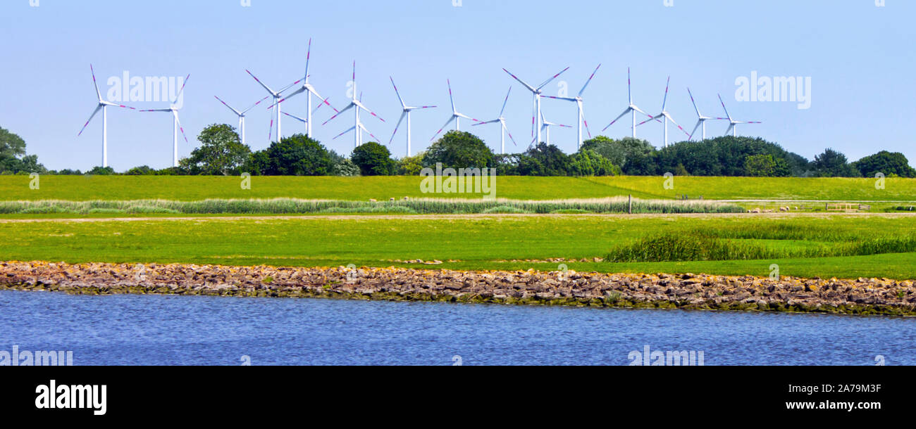 Wind energy landscape with wind wheel Stock Photo - Alamy
