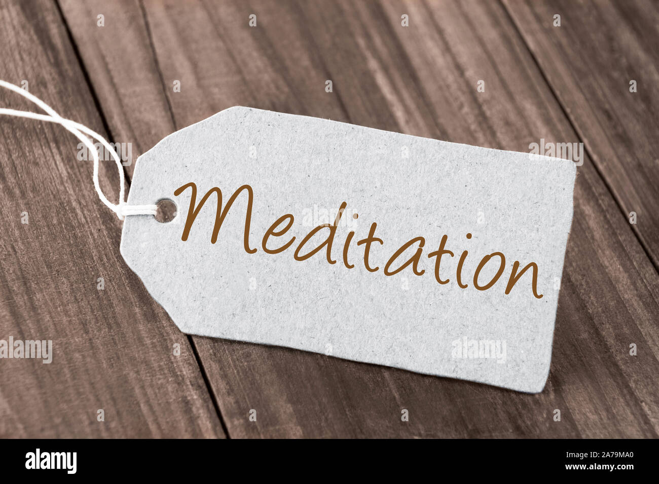 Meditation Label on wooden background Stock Photo - Alamy