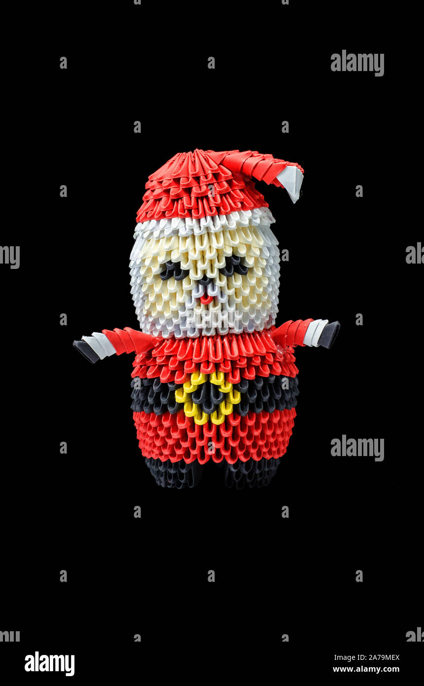 3D origami Santa Claus Father Christmas decoration isolated on black ...