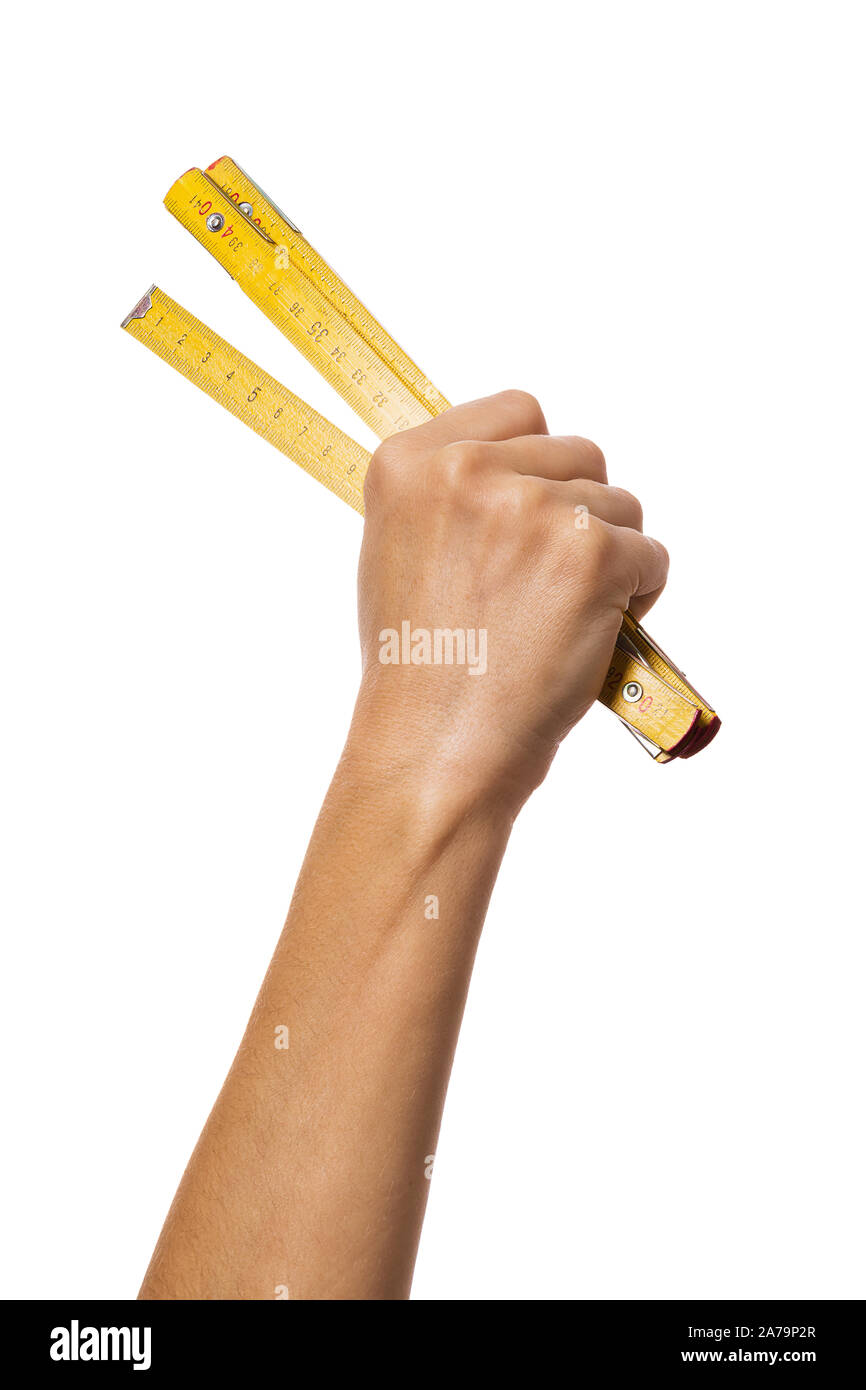 Folding tool for measuring distance in a hand Isolated on a white ...