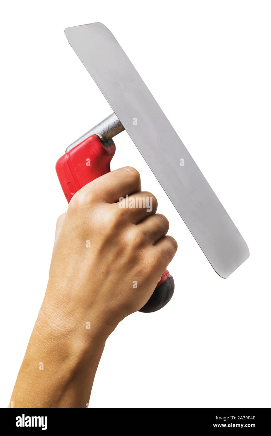 Trowel in hand isolated on a white background. Hand raised up holds a ...
