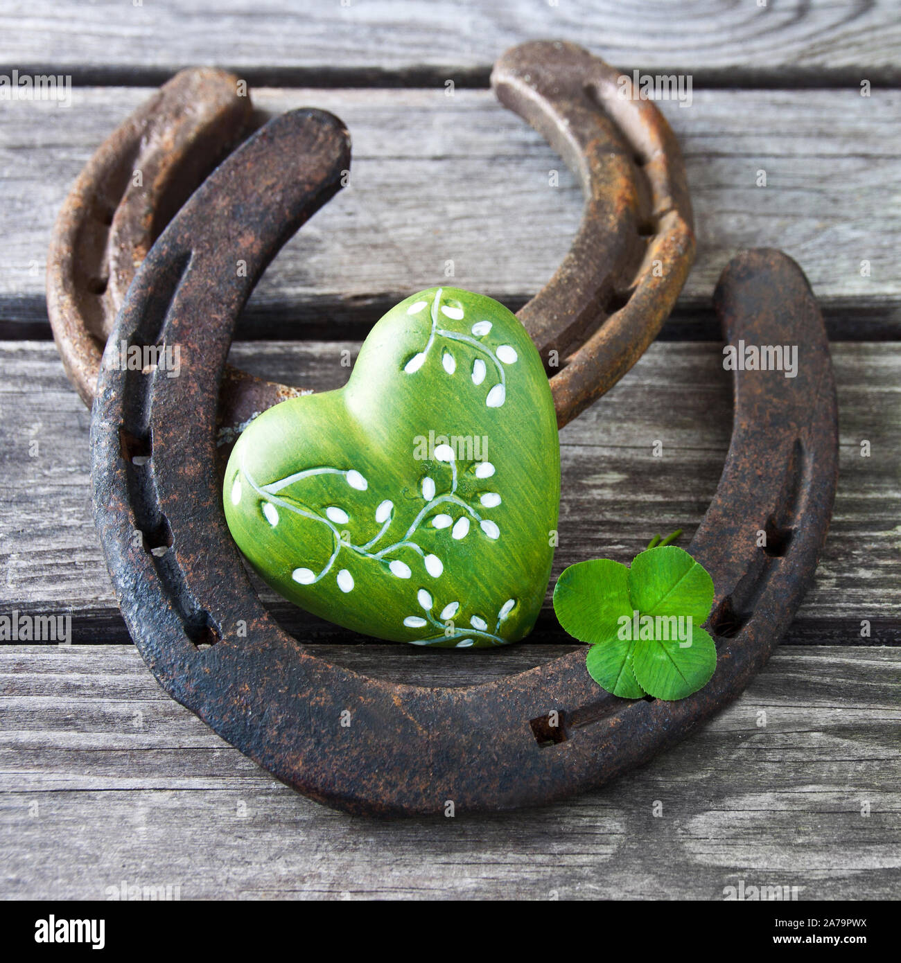 Lucky symbol with horseshoe and heart Stock Photo - Alamy