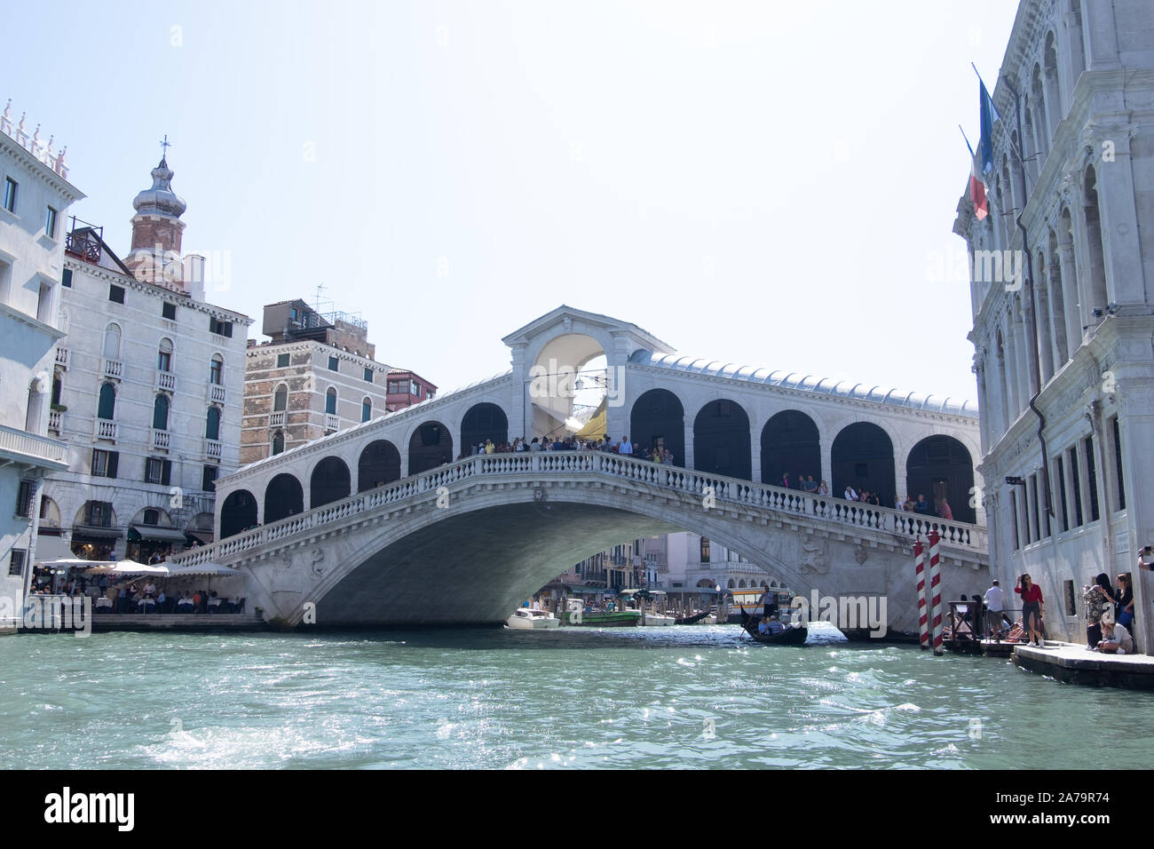 Views of the famous Rialto bridge over the Grand Canal of Venice, Italy ...