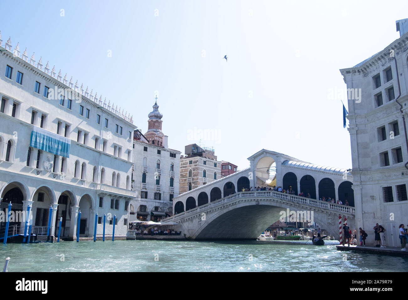 Views of the famous Rialto bridge over the Grand Canal of Venice, Italy ...