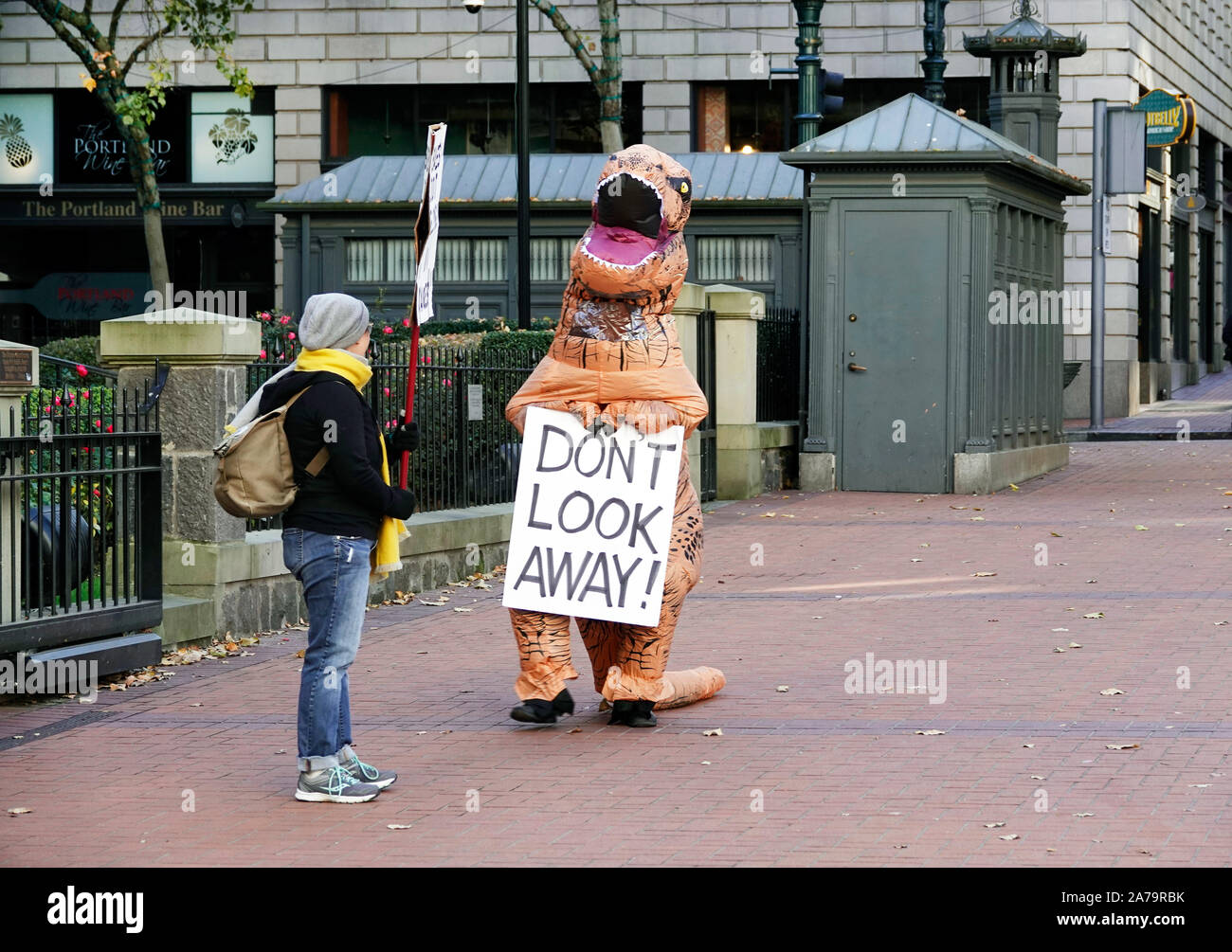 Students protest the cruel treatment of animals at a rally in Pioneer ...