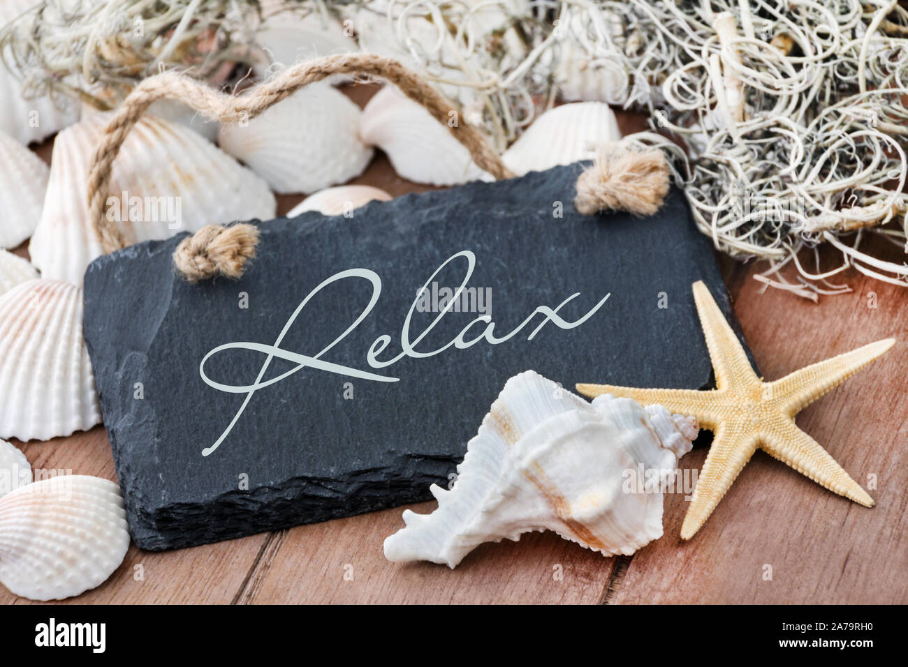 Relax label with nautic decoration Stock Photo - Alamy