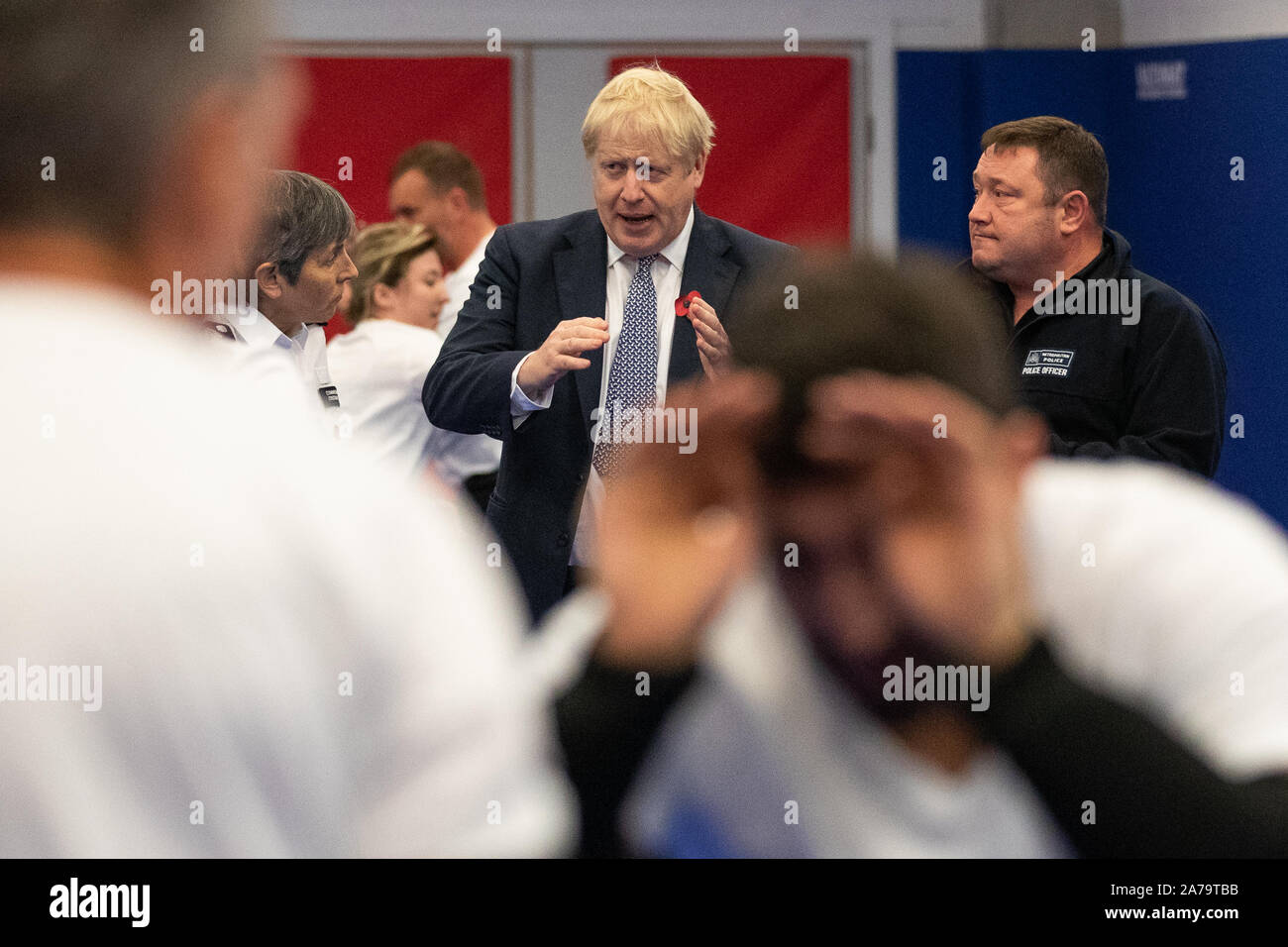 Prime Minister Boris Johnson observes a self defence class during a ...