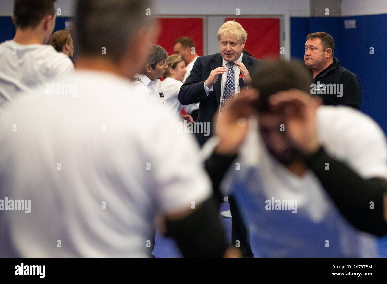 Prime Minister Boris Johnson observes a self defence class during a ...