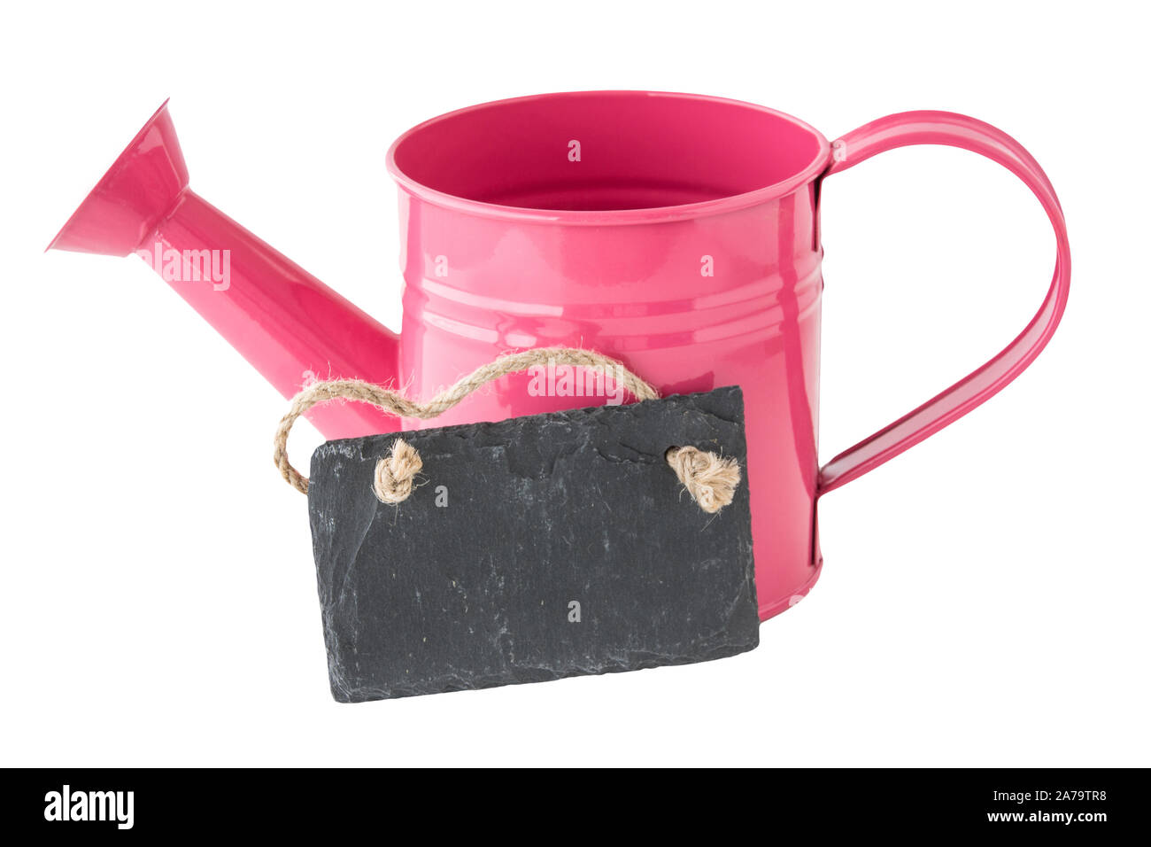 Watering can with label on white background Stock Photo - Alamy