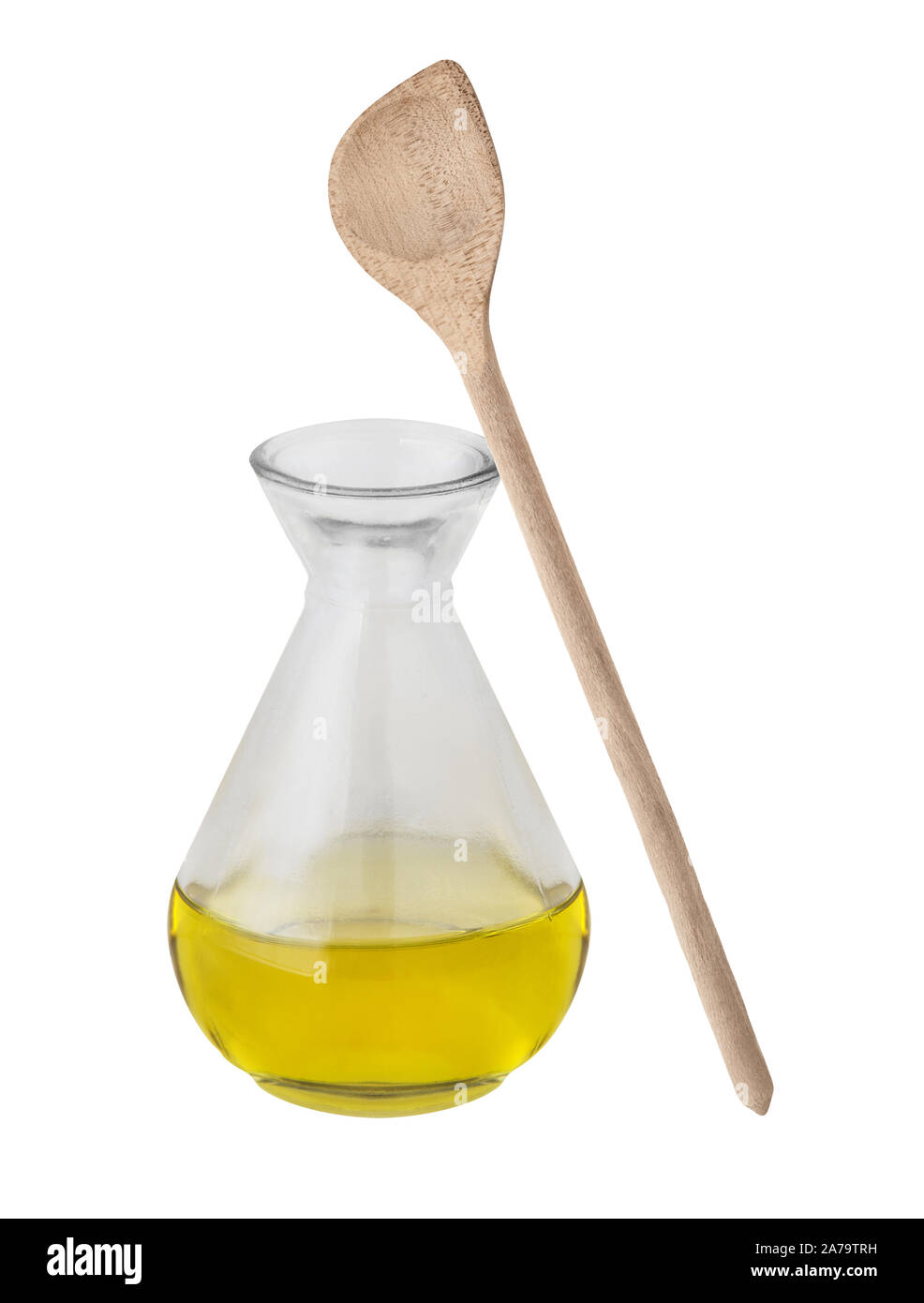 Cooking oil and spoon on a white background Stock Photo - Alamy