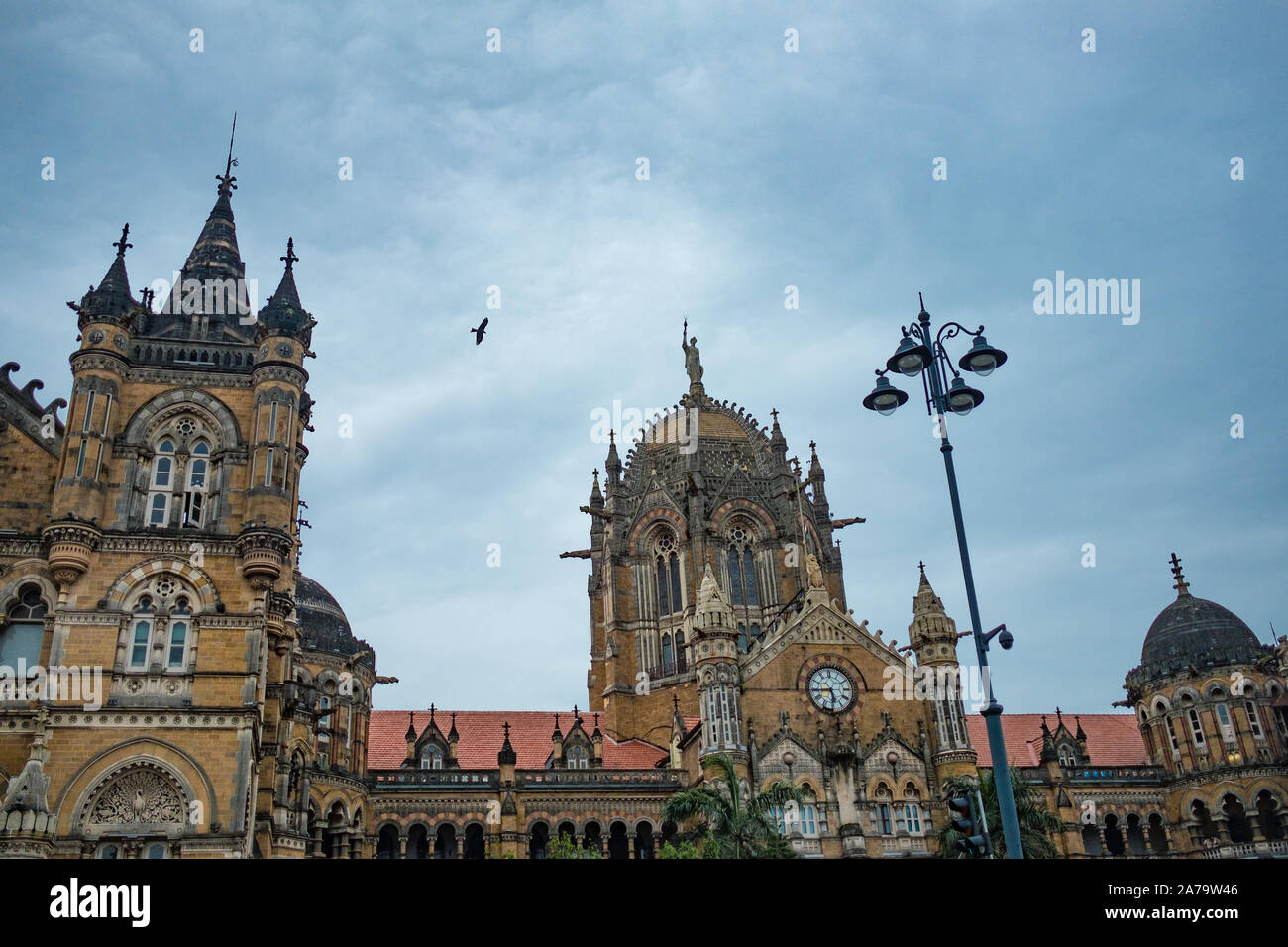 front view of mumbai central railway station during dark grey moody ...